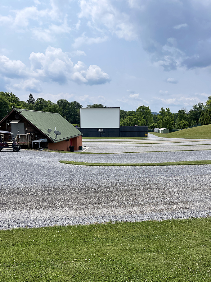 Park Place Drive-In's screen stands tall against mountain silhouettes. Mother Nature's theater walls can't be beat!