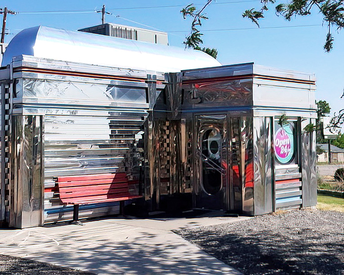 Penny's chrome exterior gleams like a desert mirage, promising weary travelers the comfort food oasis they've been dreaming about.