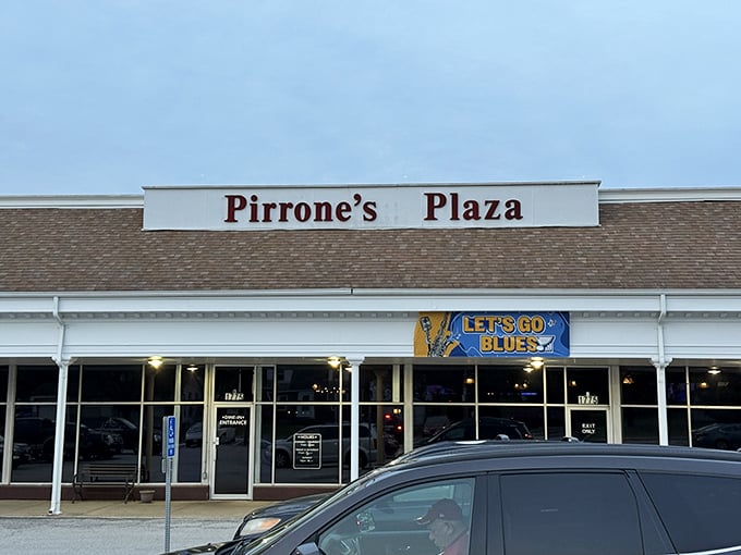 Pirrone's Plaza might look like any strip mall, but locals know better. It's where pizza dreams come true behind those unassuming windows.