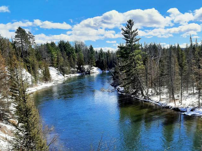 Ponca's countryside showcases what makes the Buffalo River region magical - rolling pastures where elk graze against a backdrop of forested mountains.