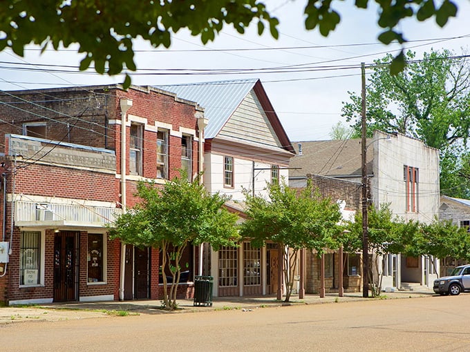 Port Gibson's mix of historic facades proves that architectural variety is the spice of small-town life, with each building telling its own weathered story.