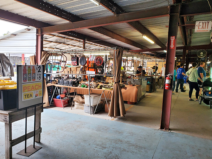 Rustic beams frame this shopper's paradise where peach tea and vintage treasures await the curious explorer.