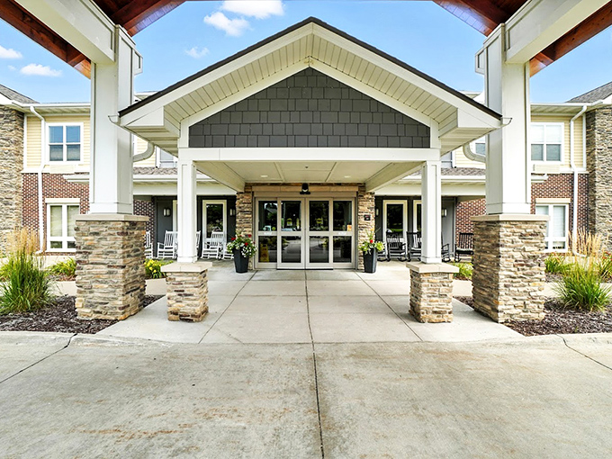Rock Creek's impressive stone columns frame an entrance that says "welcome home" with architectural eloquence and Midwestern charm.