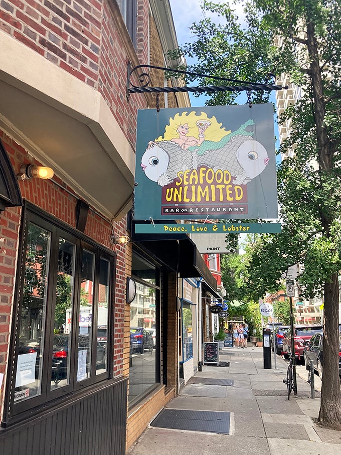 Seafood Unlimited: Nestled among Philly's brick buildings, that playful mermaid sign hints at oceanic delights within this neighborhood favorite.