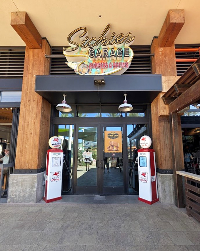 Sickies Garage welcomes you with vintage gas pumps and a promise of automotive-themed burger bliss. Fuel for your stomach, not your car!