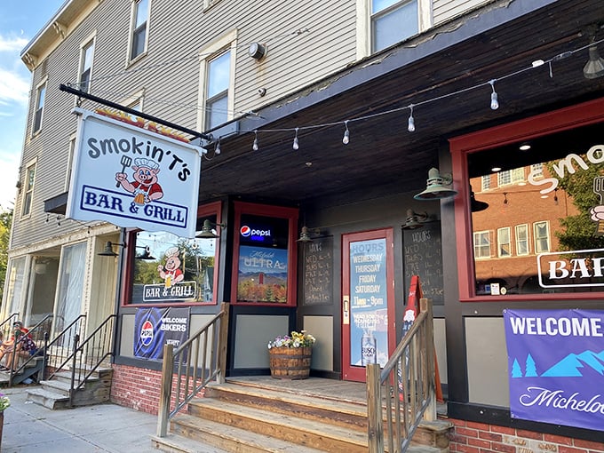 Smokin T's Bar & Grill brings a touch of BBQ charm to historic Lancaster. That red door leads to smoky paradise!