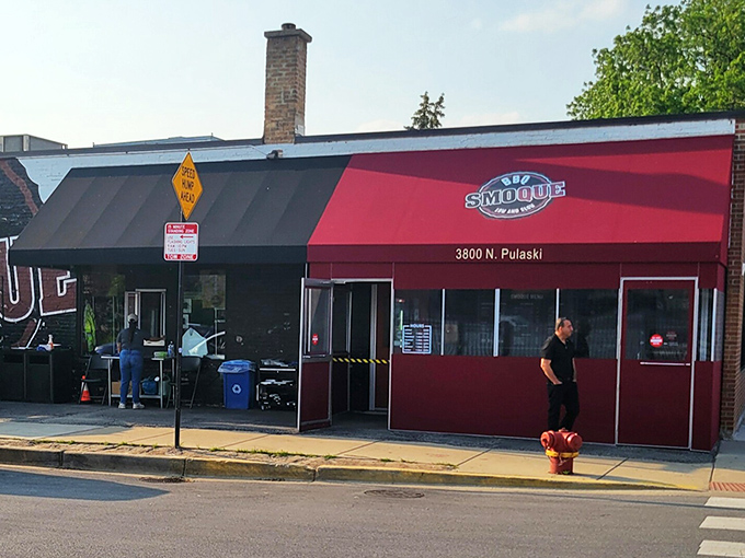 Smoque's classic red awning stands like a beacon of hope for Chicago's serious barbecue enthusiasts &ndash; no frills, just smoky thrills.