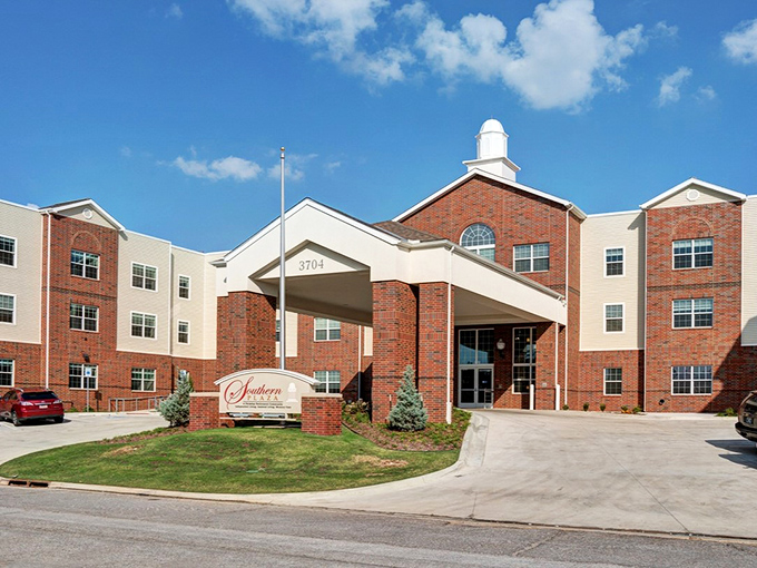Multi-story living with classic red brick appeal that says "home" in every architectural detail.