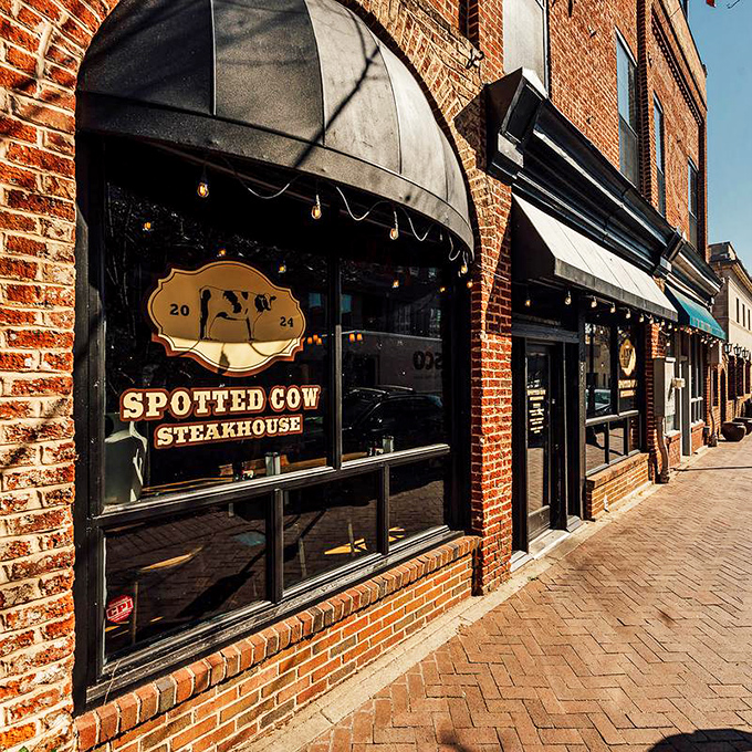 Behind that elegant black awning lies a cow-themed paradise where steaks are the stuff of legend.