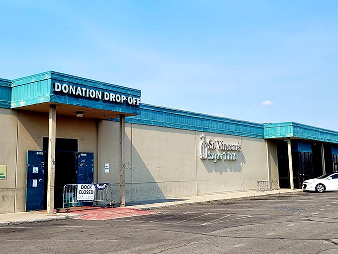 St. Vincent's donation drop-off - where yesterday's extras become tomorrow's essentials under that turquoise awning.