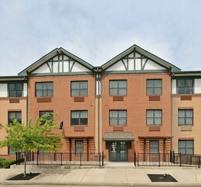 St. William's welcoming entrance with covered drop-off area &ndash; because nobody enjoys a rainy arrival!