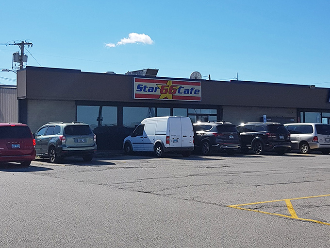 Star 66 Cafe shines bright against the night sky, a roadside oasis where Route 66 history meets homestyle cooking.