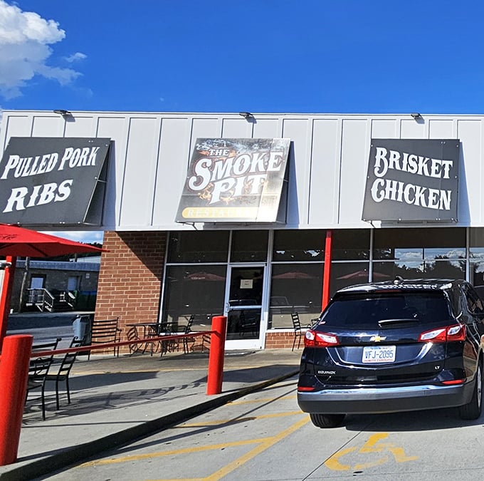 The Smoke Pit doesn't mince words &ndash; those bold signs tell you exactly what awaits inside this Concord favorite.