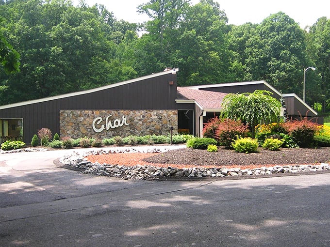 The Char's distinctive stone exterior stands like a beacon for steak lovers—a Beckley landmark where charcoal-grilled perfection awaits.