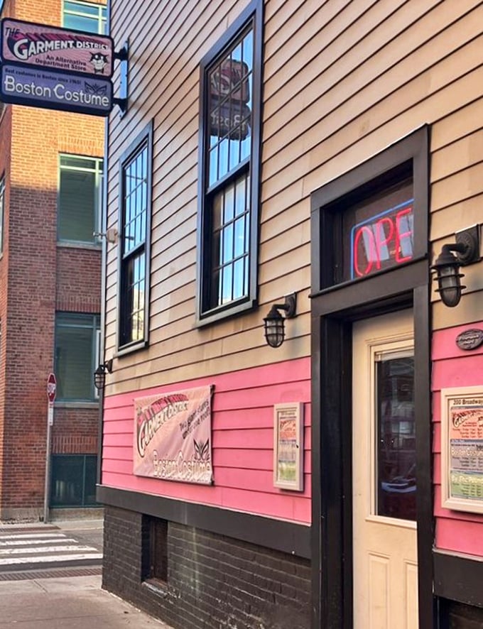 The Garment District's distinctive pink facade stands out in Cambridge like a fashionable rebel among the brick buildings.