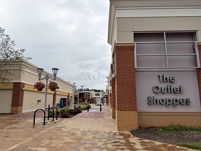 Clean brick walkways and thoughtful landscaping create an outdoor mall experience that actually makes shopping pleasant again.