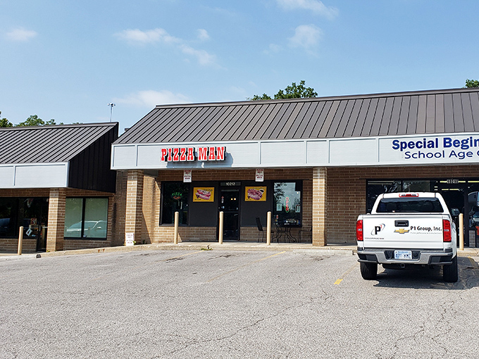 Pizza Man's humble strip mall location proves that extraordinary flavors often come from the most unexpected places.