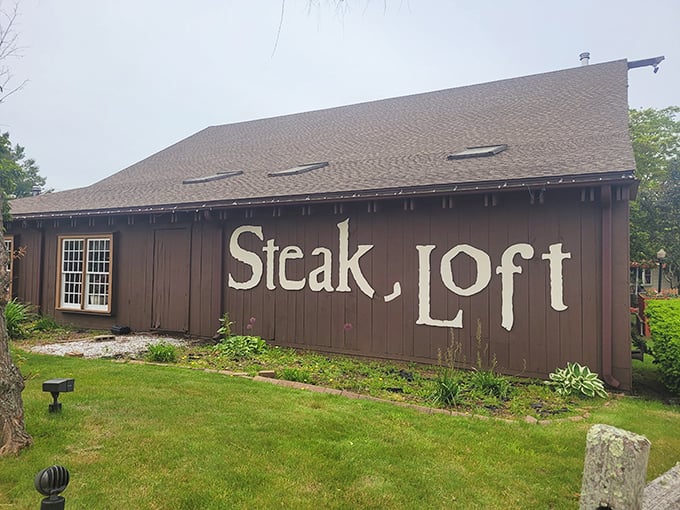 The Steak Loft's rustic wooden sign has been directing hungry folks to beefy bliss for generations.
