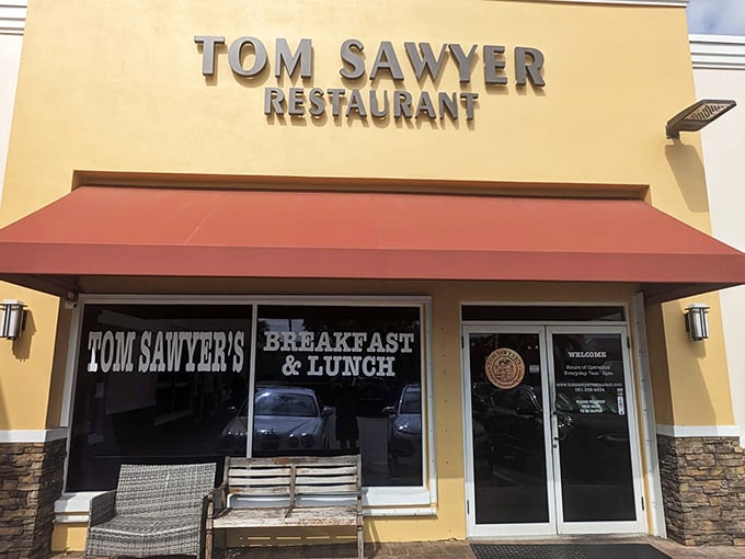 Tom Sawyer would approve of this sunny yellow facade. No need to whitewash fences when breakfast is this good!
