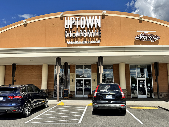 The elegant curved architecture of Uptown Cheapskate elevates thrifting to a stylish experience.