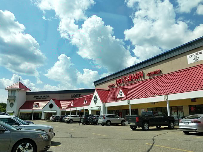 Red roofs and white storefronts create a shopping village where Ann Taylor and LOFT offer refuge for fashion-forward bargain hunters.
