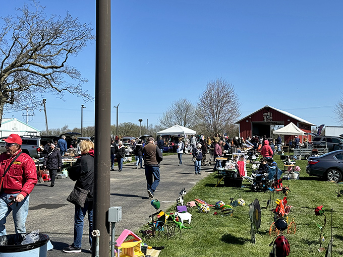 Spring sunshine illuminates this bustling market where neighbors gather to share stories and swap treasures.