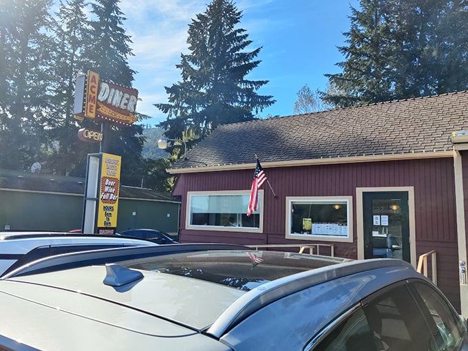 ACME Diner: American flag, rustic charm, and mountain views. This little roadside gem is worth the drive to tiny Acme, Washington.