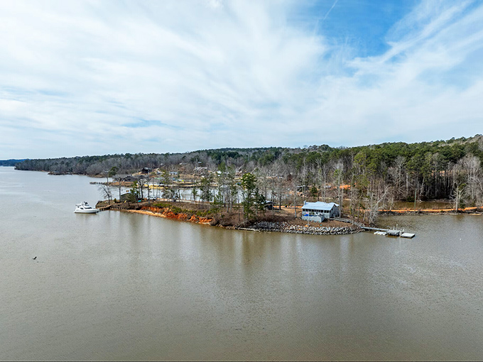 This little Alexander City peninsula whispers, "Retirement doesn't need to be complicated." Just add water, trees, and a dock for instant paradise!