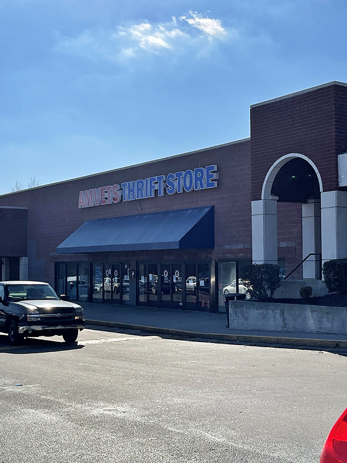 Morning light catches AMVETS' bold signage, promising a day of discovery where every purchase supports those who served.