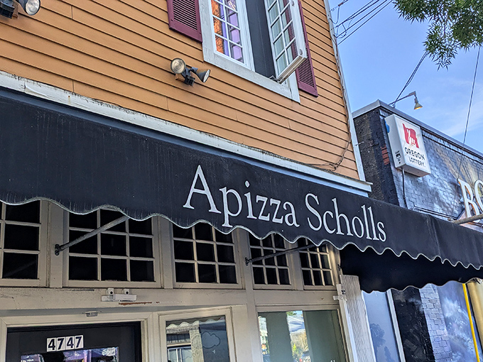 That modest awning shelters Portland's worst-kept secret: New Haven-style pizza that'll ruin you for chain stores. 