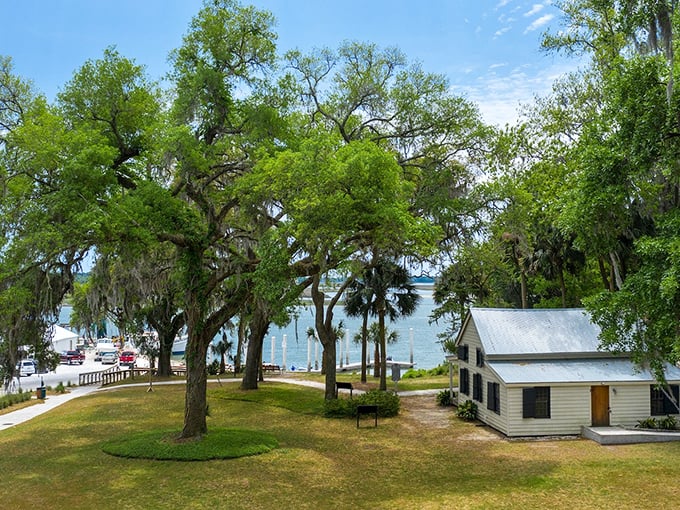 Bluffton's waterfront views come with a side of serenity. That little white building has probably witnessed more sunsets than most of us ever will.