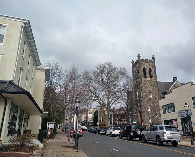 That stone church anchoring Doylestown's skyline has witnessed more history than most history books contain.
