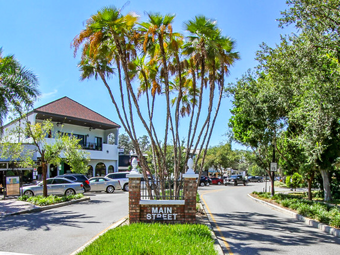 This isn't just a street; it's a tropical invitation to what I hope is the best damn diner in town.