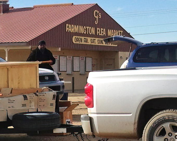 Unloading treasures from the truck! Farmington's vendors arrive early, transforming empty spaces into wonderlands of possibility one cardboard box at a time.