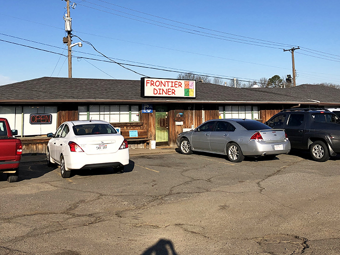 Frontier Diner (parking lot): "The packed parking lot tells you everything you need to know &ndash; nobody waits in line for mediocre biscuits and gravy."