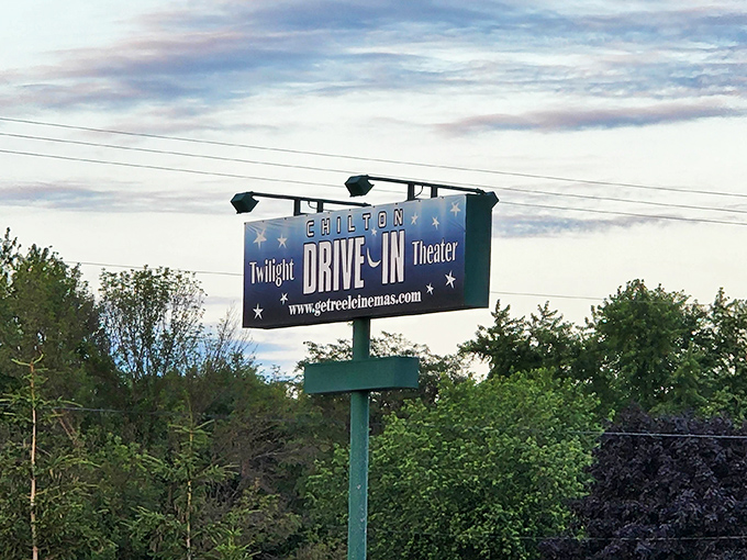 Stars on the sign, stars in the sky! Chilton's twilight marquee promises movie magic while Wisconsin's evening softly paints the clouds pink.