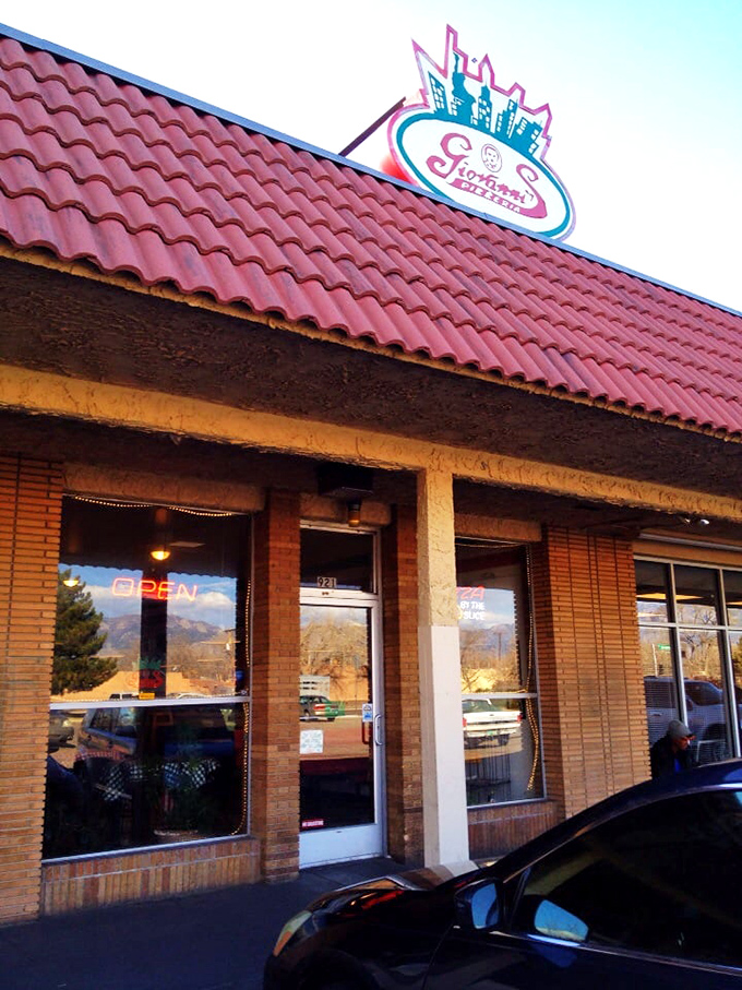 That iconic red-tiled roof isn't just for show &ndash; it's Giovanni's way of signaling "serious pizza happening here" to hungry Albuquerque residents.