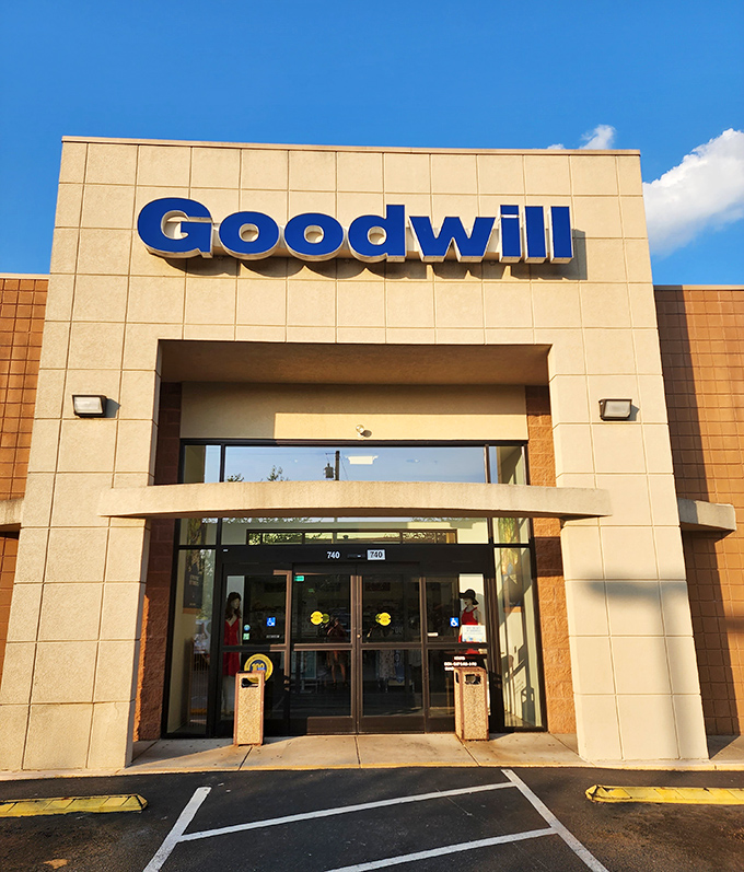 That big blue Goodwill sign is like a beacon of hope for both your wallet and your wardrobe. The spacious entrance promises room to browse without bumping elbows.