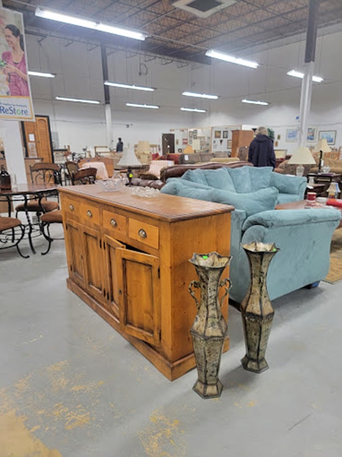 That blue sofa might become the centerpiece of someone's living room story&mdash;ReStore's furniture awaits its second act.