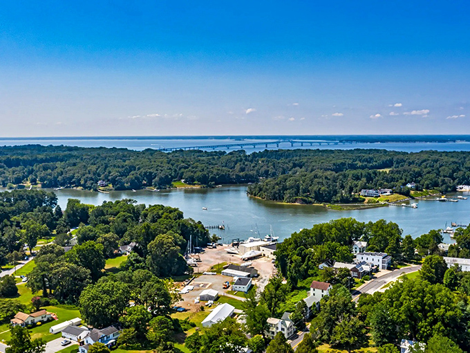 The Chesapeake spreads out like a blue-green blanket, dotted with boats and framed by endless green shoreline.