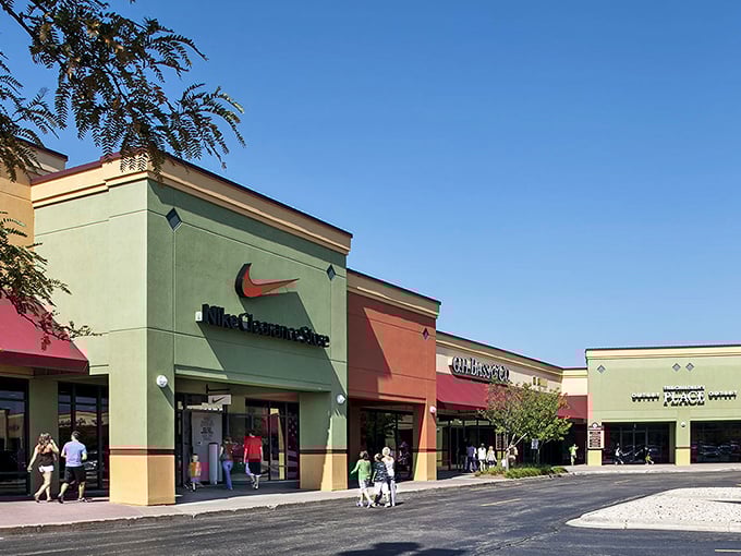 Nike's swoosh beckons shoppers into a world of discounted athletic dreams at Johnson Creek—resistance is futile!