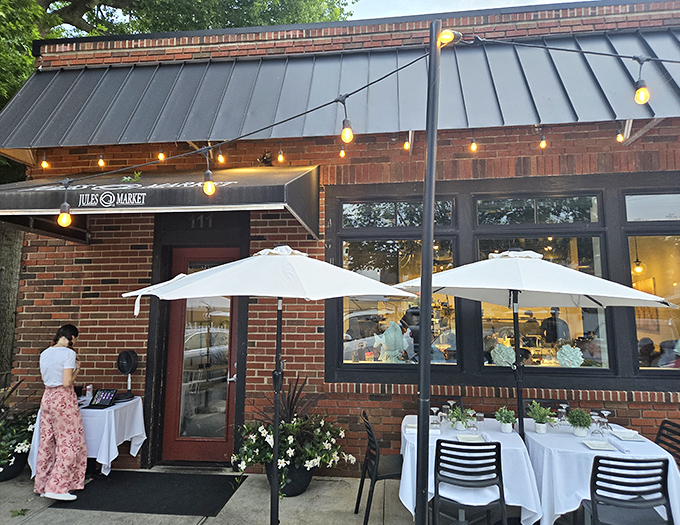 The elegant brick exterior of Jules at Market hints at the culinary magic happening inside.