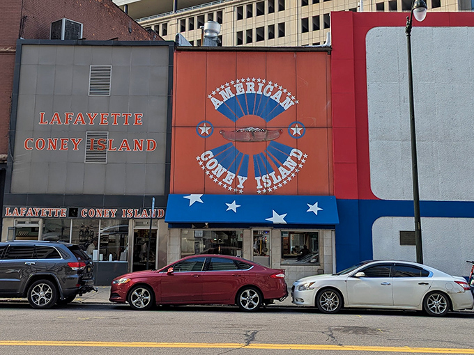 That patriotic red, white, and blue facade tells you everything about Detroit's most beloved coney island.