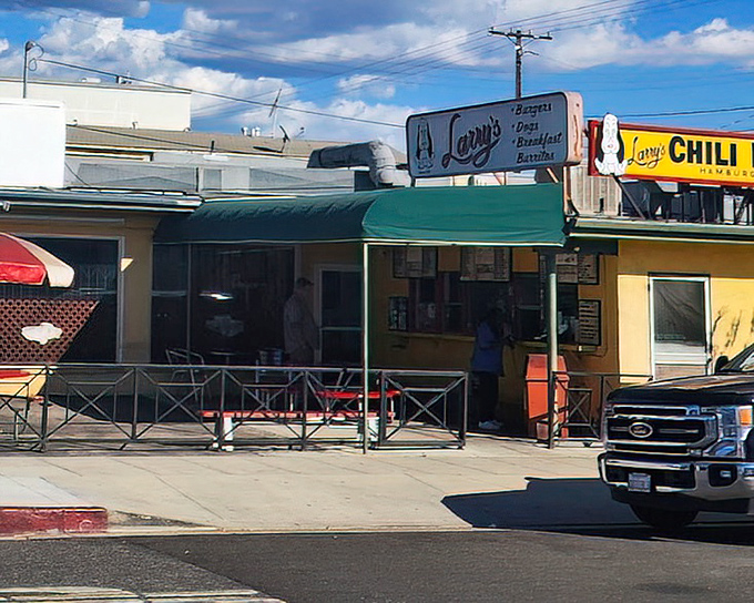 Larry's outdoor setup creates the perfect backyard barbecue vibe - comfort food tastes better under open skies.