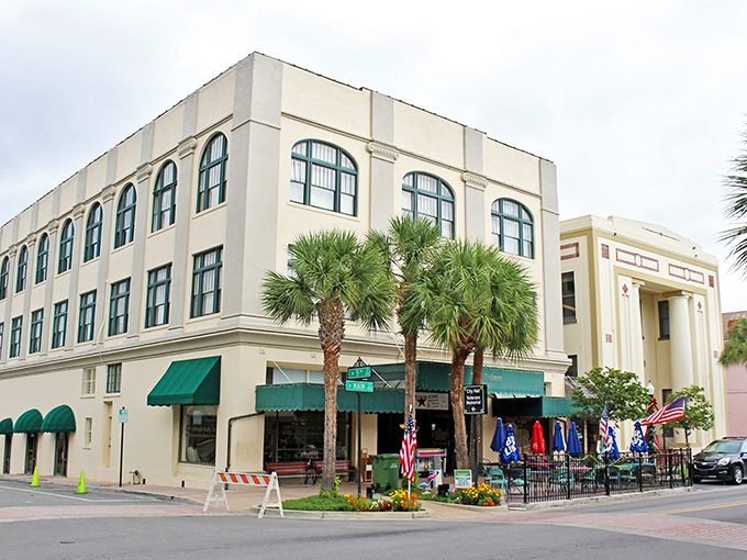 Palm-lined streets create natural umbrellas over sidewalks perfect for morning coffee walks.