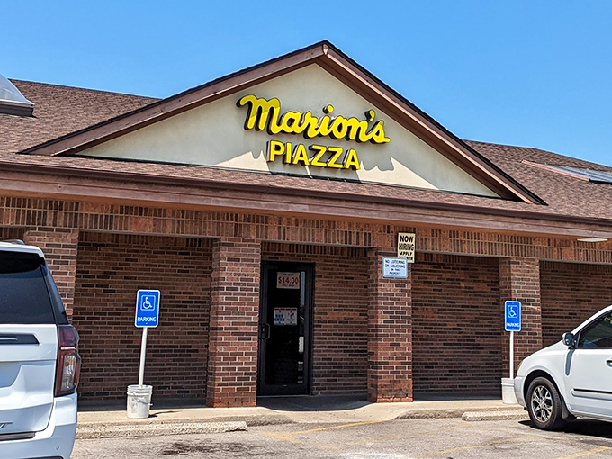 That welcoming brick facade has become synonymous with Ohio's most distinctive pizza style.
