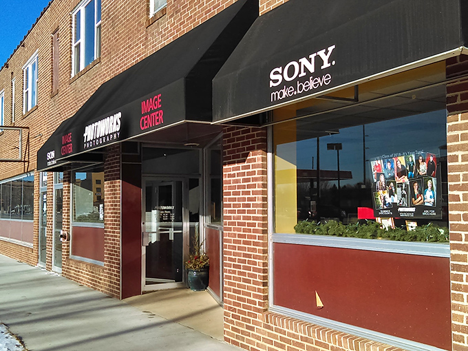 Historic architecture meets everyday life where people still shop locally and support their neighbors' businesses with loyalty.