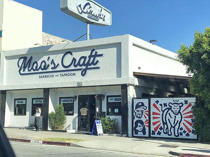 The bold signage and funky cow mural hint at Moo's personality: serious about barbecue, but never too serious about itself.