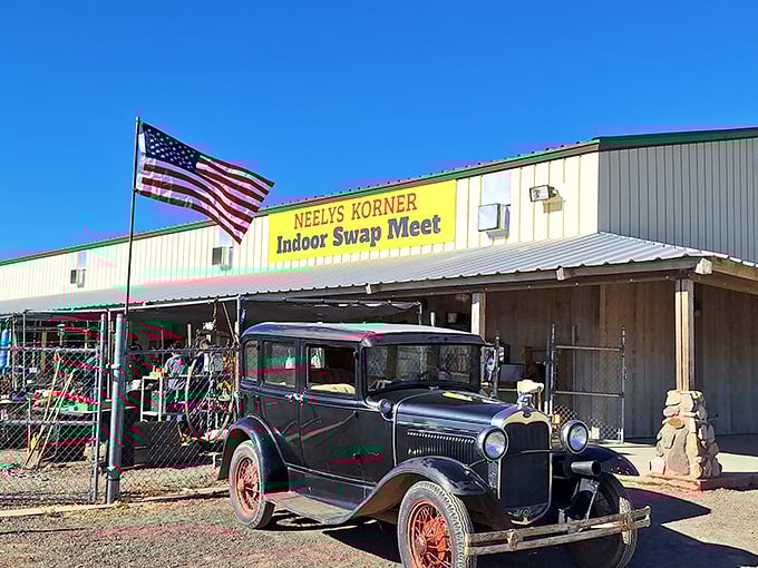 Classic Americana alert! Neely's Korner pairs a vintage black beauty with red wheels against the crisp Arizona flag&mdash;Norman Rockwell would've painted this scene in a heartbeat.