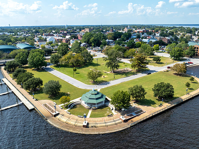 The Neuse River curves around town like a protective arm, offering peace to anyone who stops to listen.